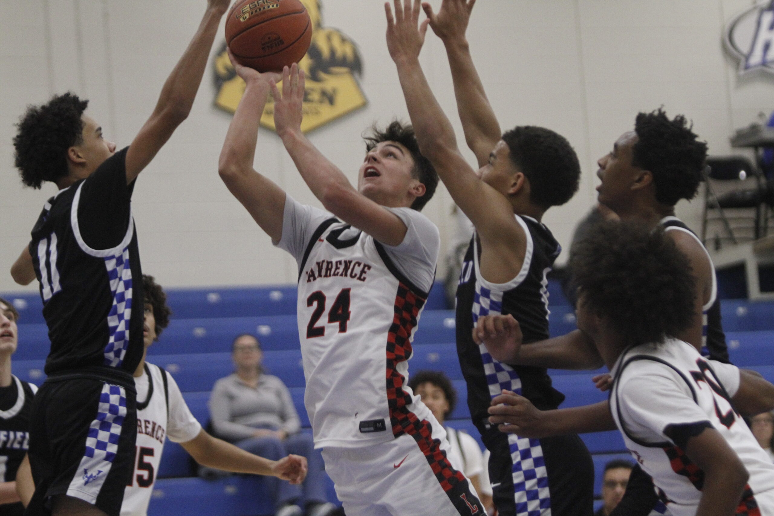 Lawrence boys basketball finishes Rupp Classic in Halstead with two ...